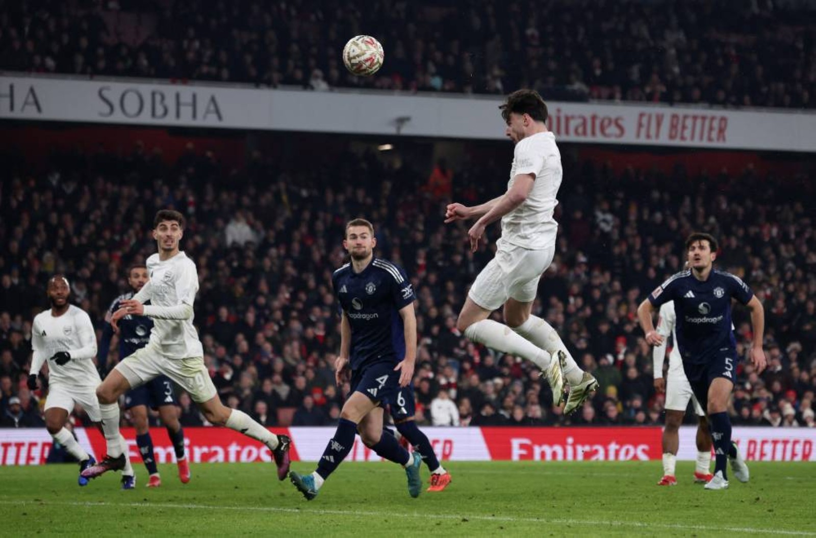 United knock Arsenal out of FA Cup, Spurs survive scare a...