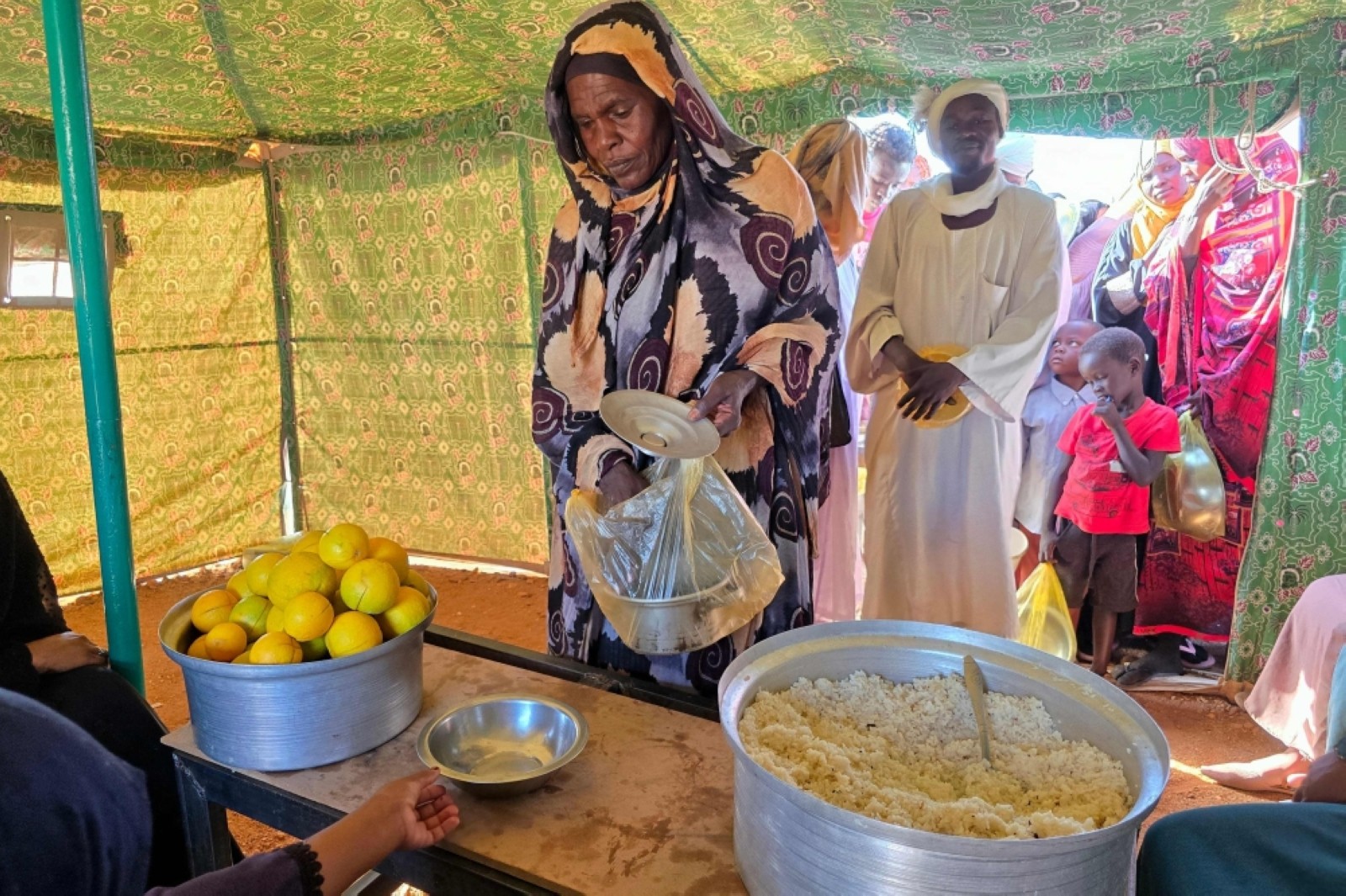 UN food agency pauses food aid in famine-hit Sudan refugee camp