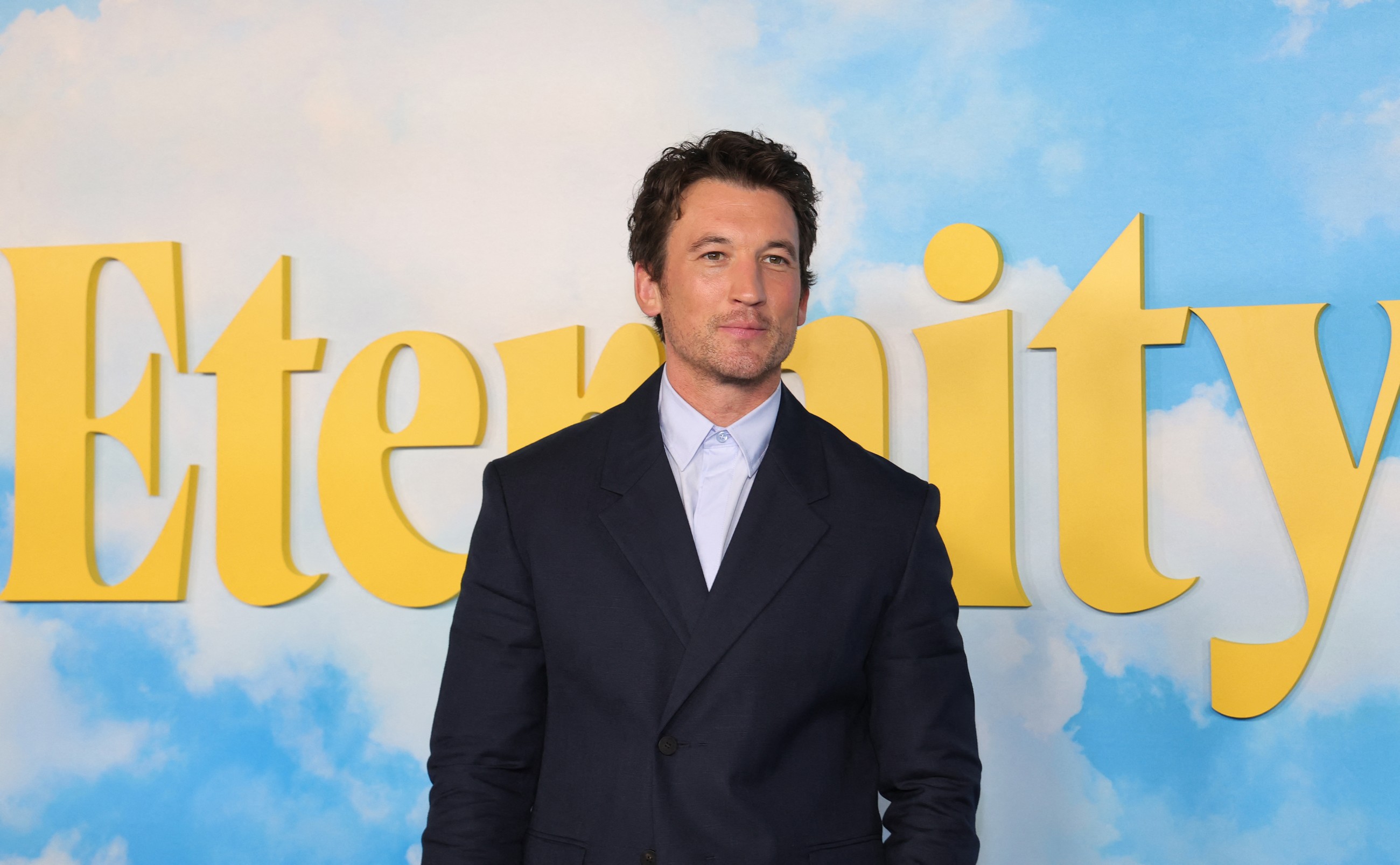 Miles Teller surprises wife with remade wedding dress