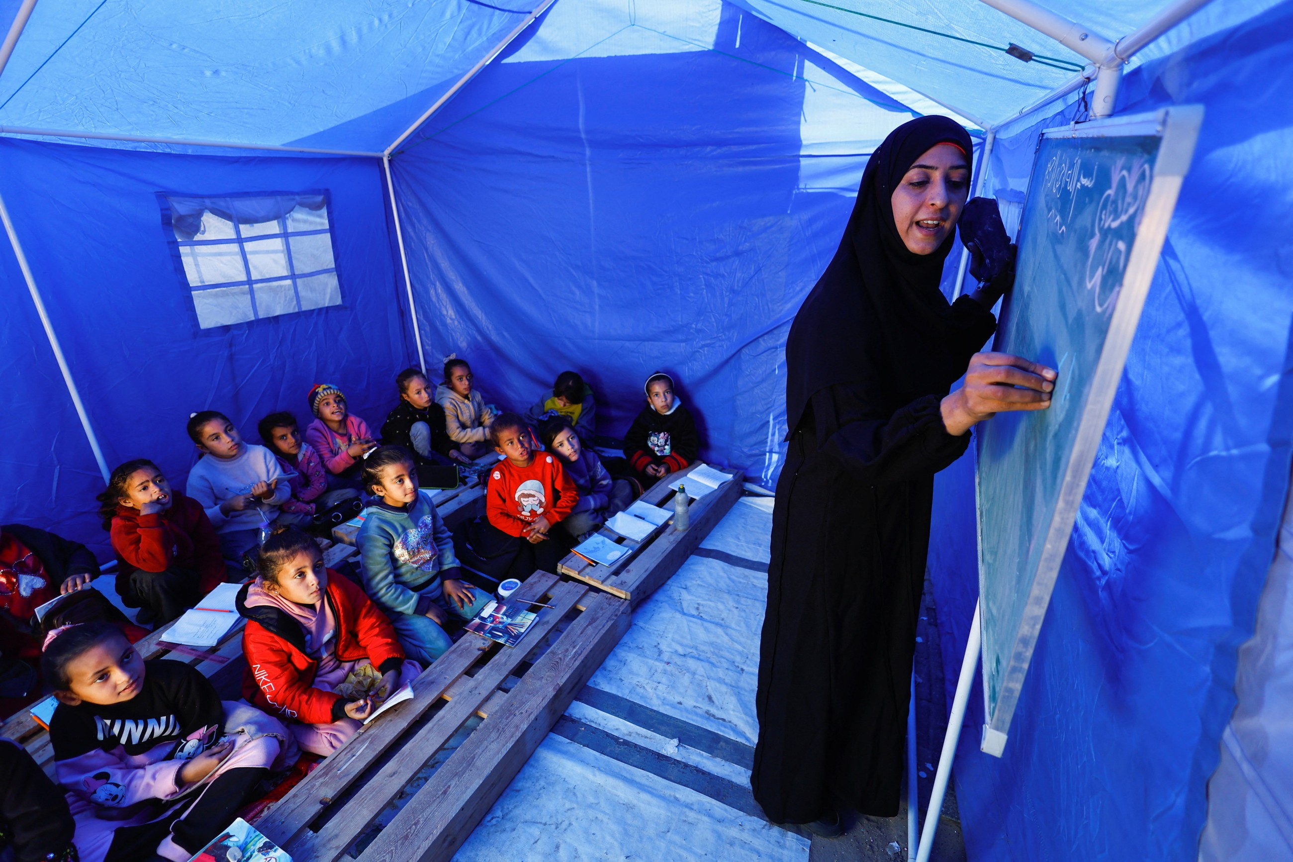 School resumes in tents under shadow of Gaza's 'yellow line'